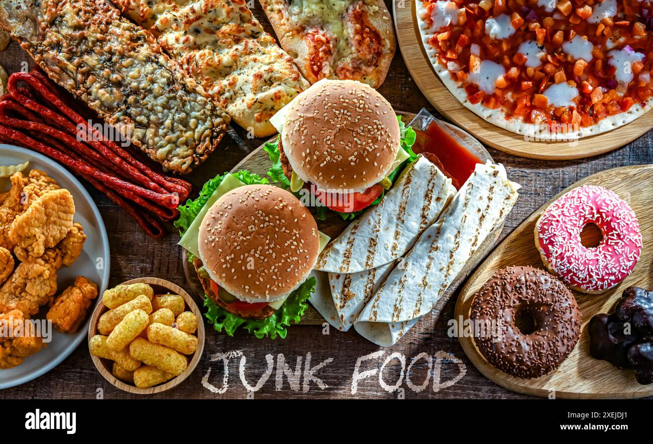 Foods enhancing the risk of cancer. Junk food Stock Photo - Alamy