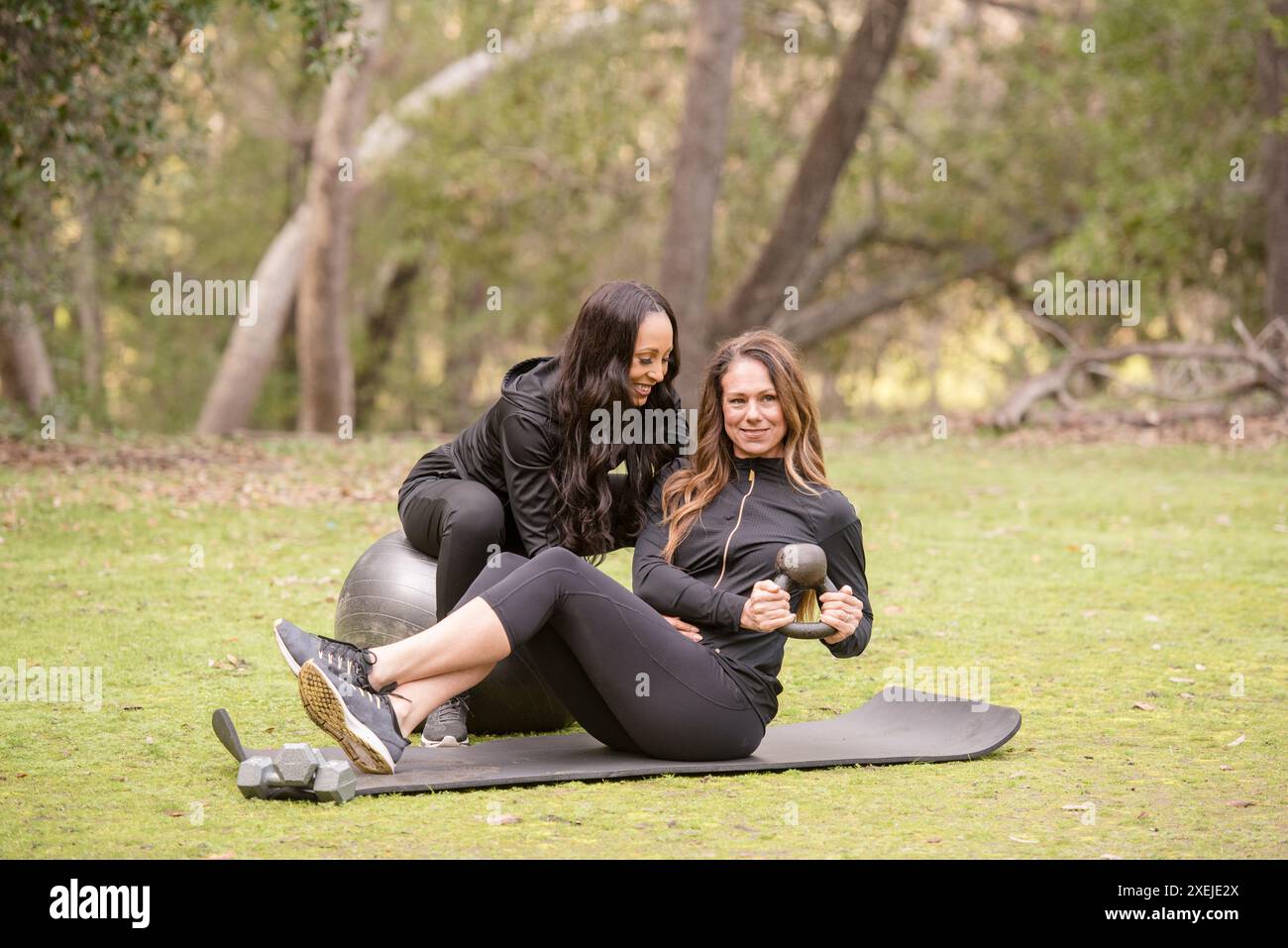 Women squat outdoor hi-res stock photography and images - Alamy
