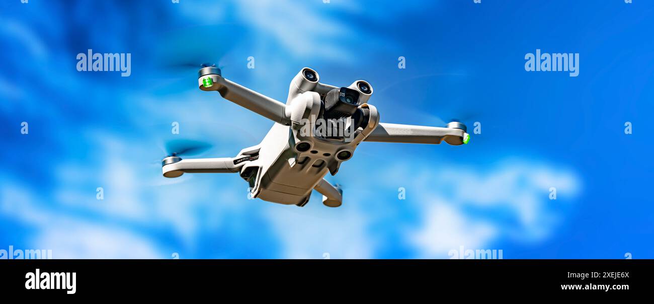 Small drone during flight Stock Photo - Alamy
