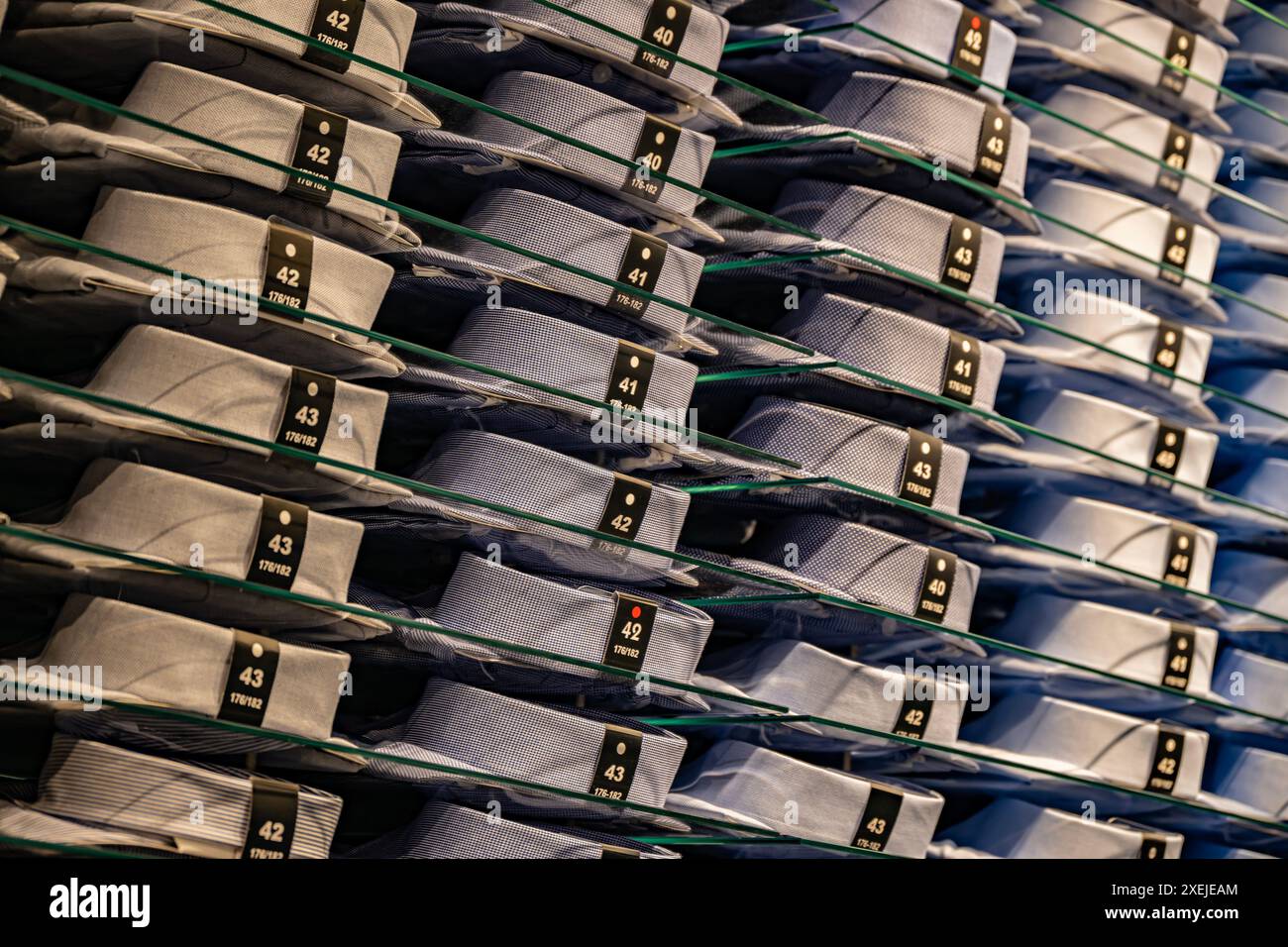 Shirts on a shelf hi-res stock photography and images - Alamy