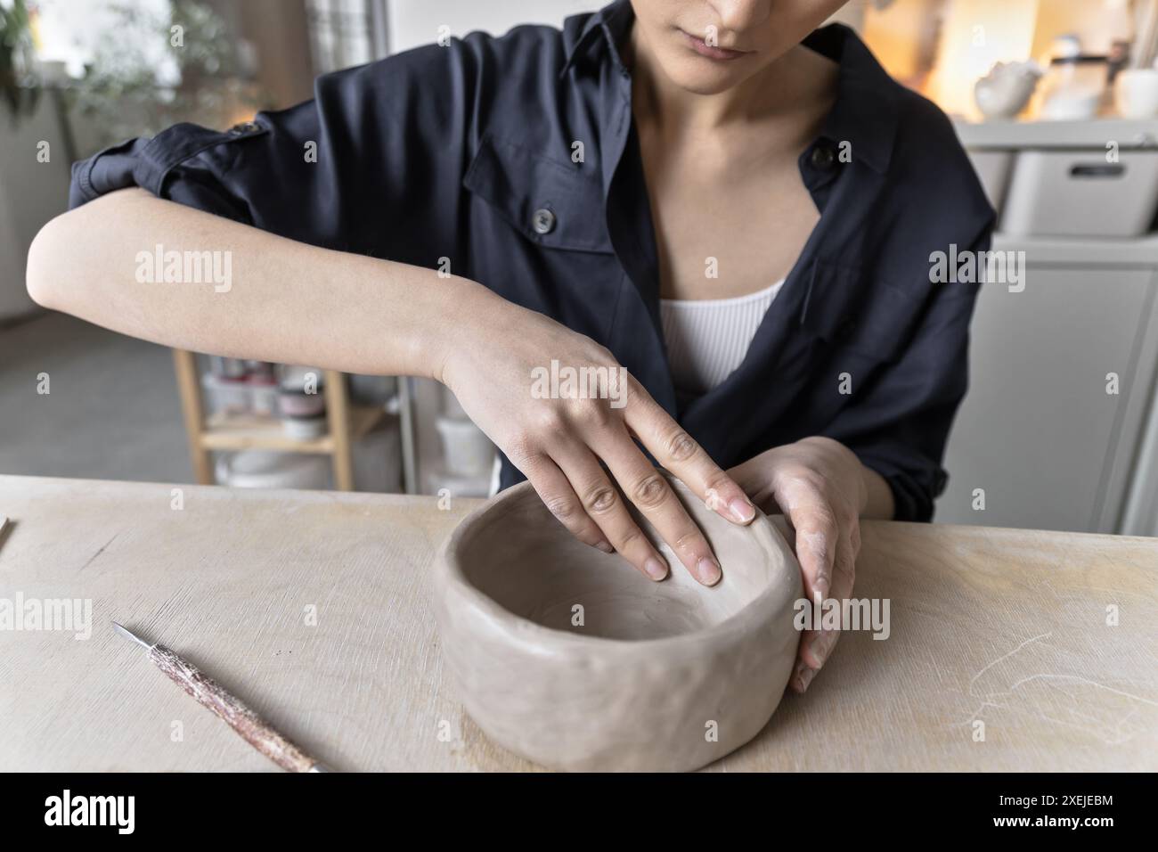 Artist forming pottery hi-res stock photography and images - Alamy