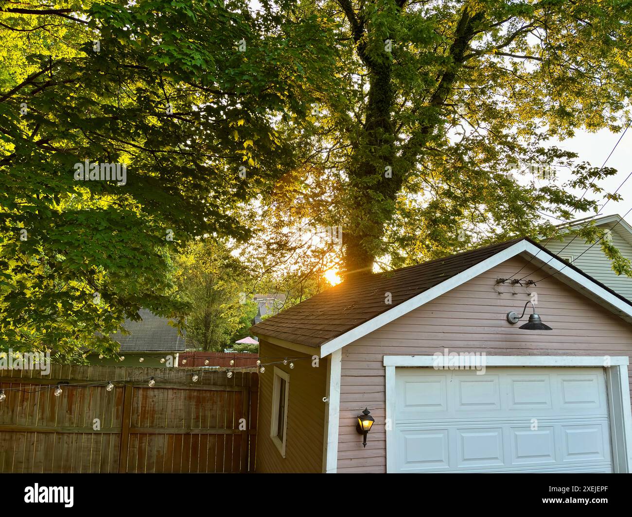 Sunset behind garage and tree in Cincinnati, Ohio Stock Photo - Alamy
