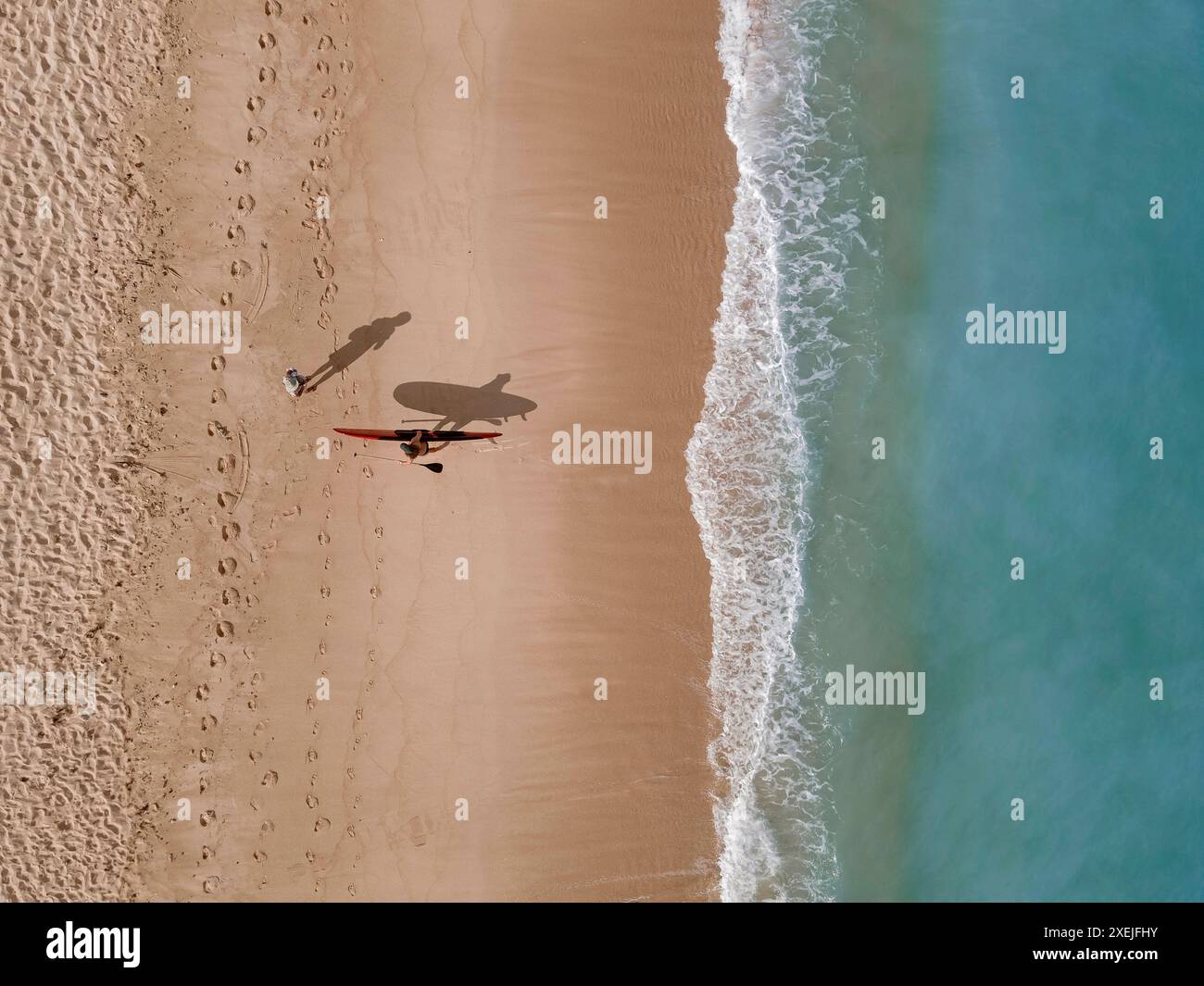 Aerial surfer man woman sup hi-res stock photography and images - Alamy