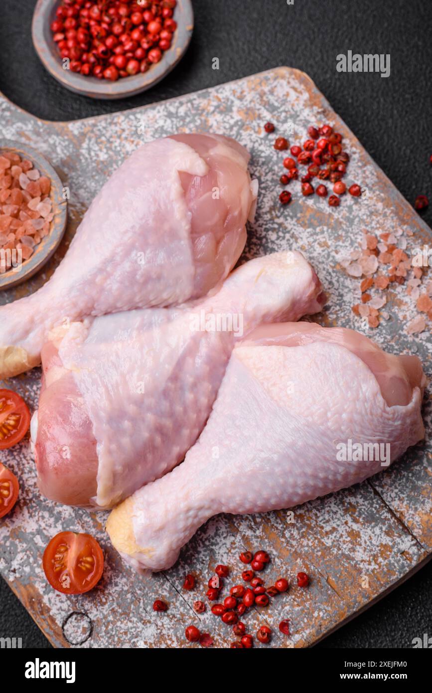 Raw chicken legs with salt Stock Photo - Alamy