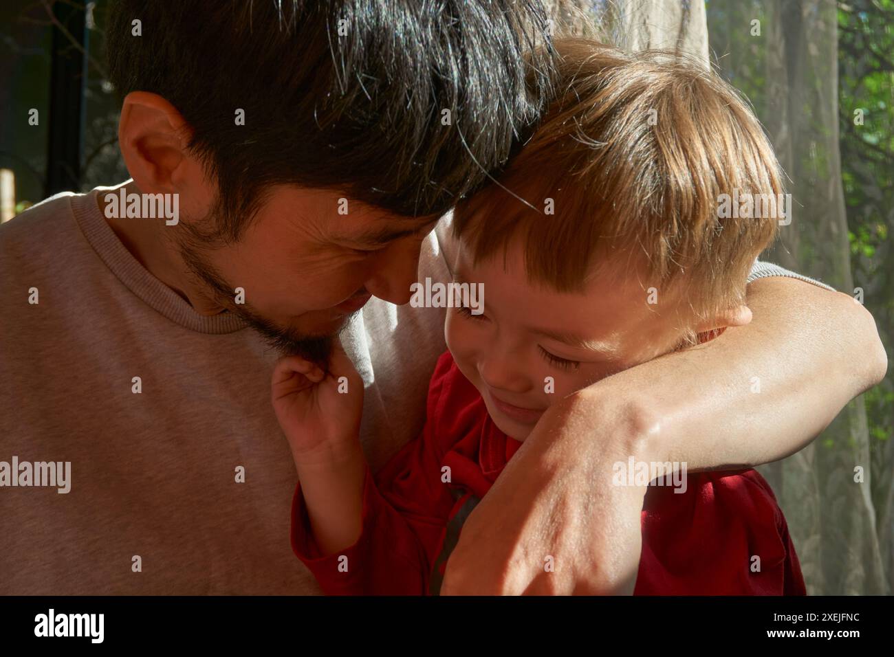 emotions of child and father Stock Photo - Alamy