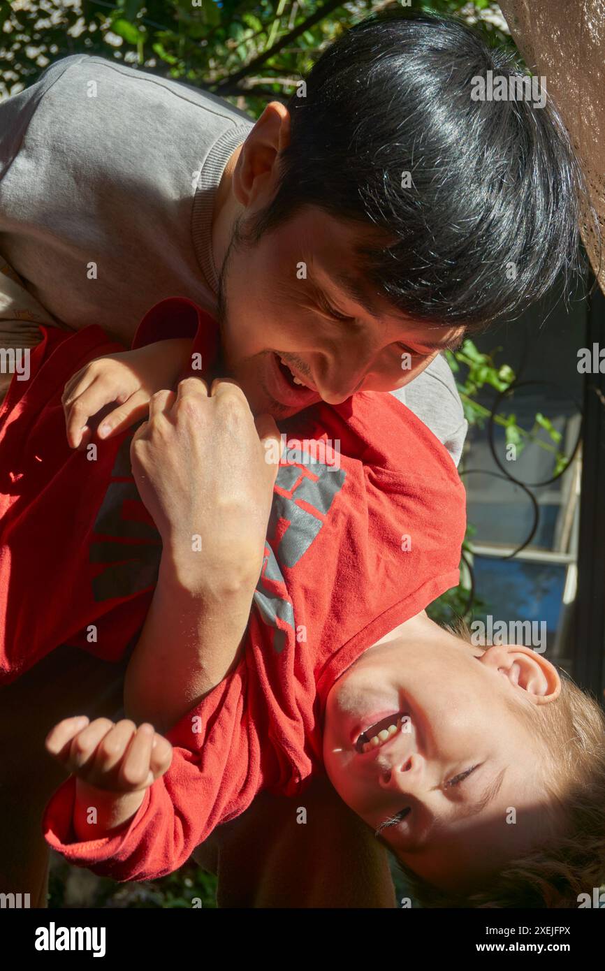emotions of child and father Stock Photo - Alamy