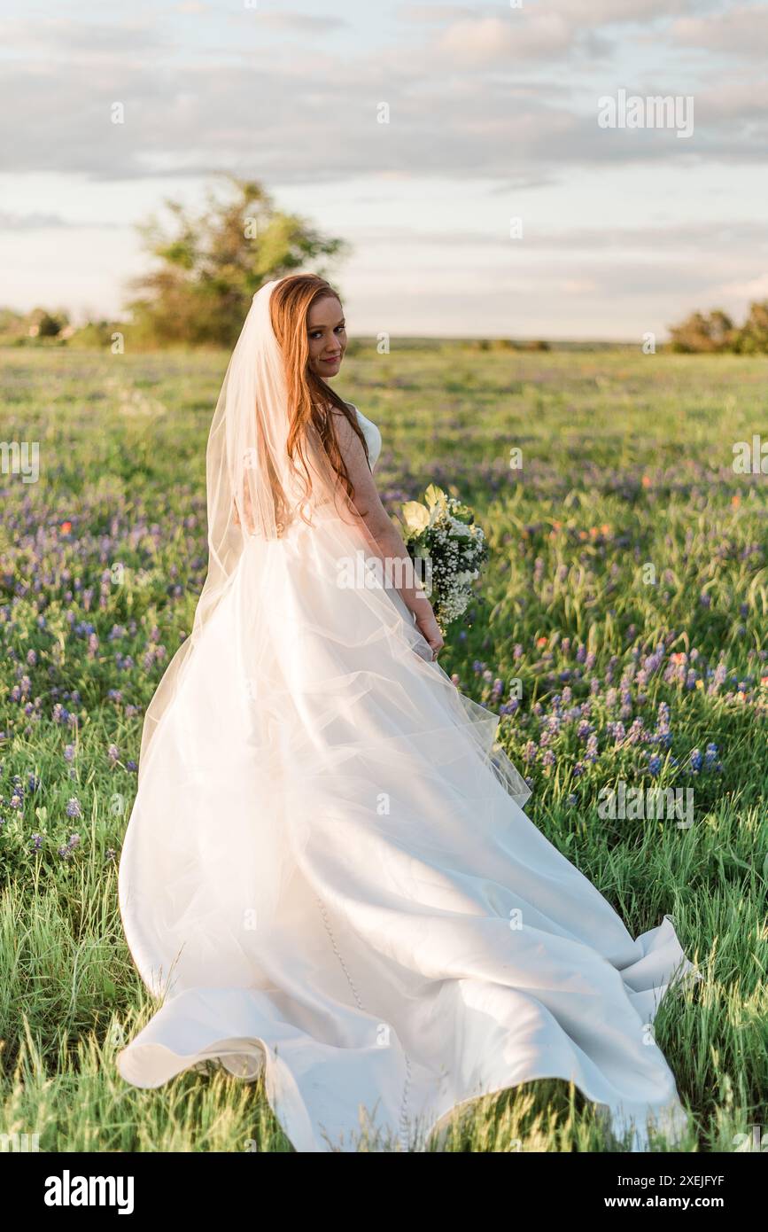 Timeless Redheaded Bride in Texas Wildflowers at Golden Hour Stock ...