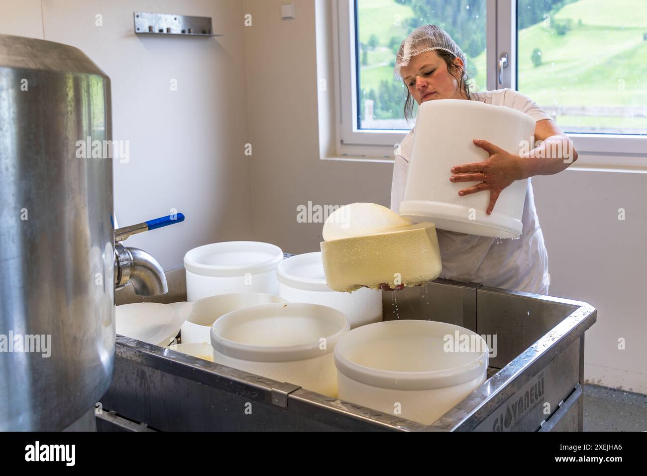 Cheese production in the cheese dairy belonging to the Filzmoosalm ...