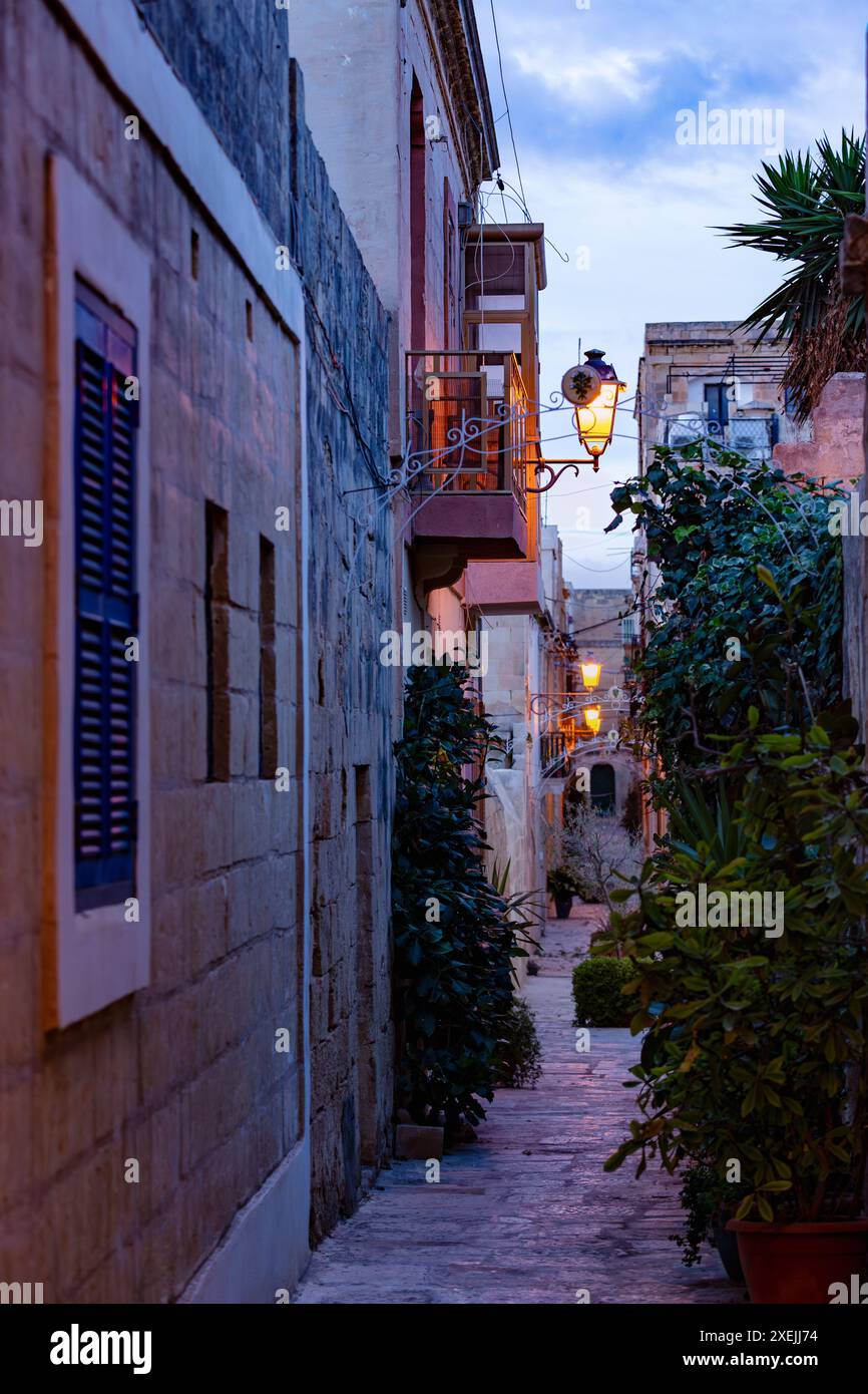 One of the small historic hidden streets in ancient city Vittoriosa ...
