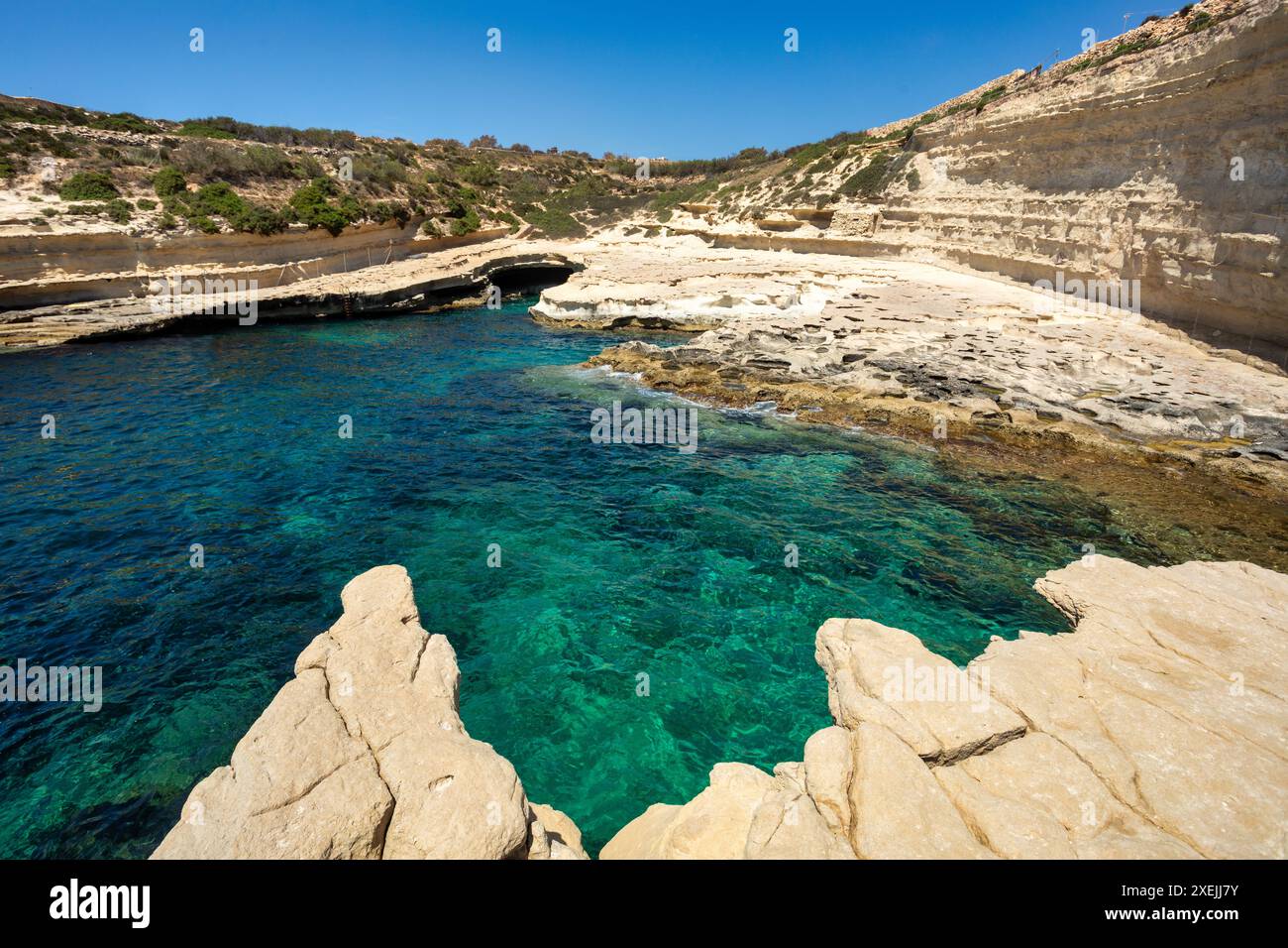 Crystal clear turquoise water in blue lagoon. St. Peters pool - rocky ...