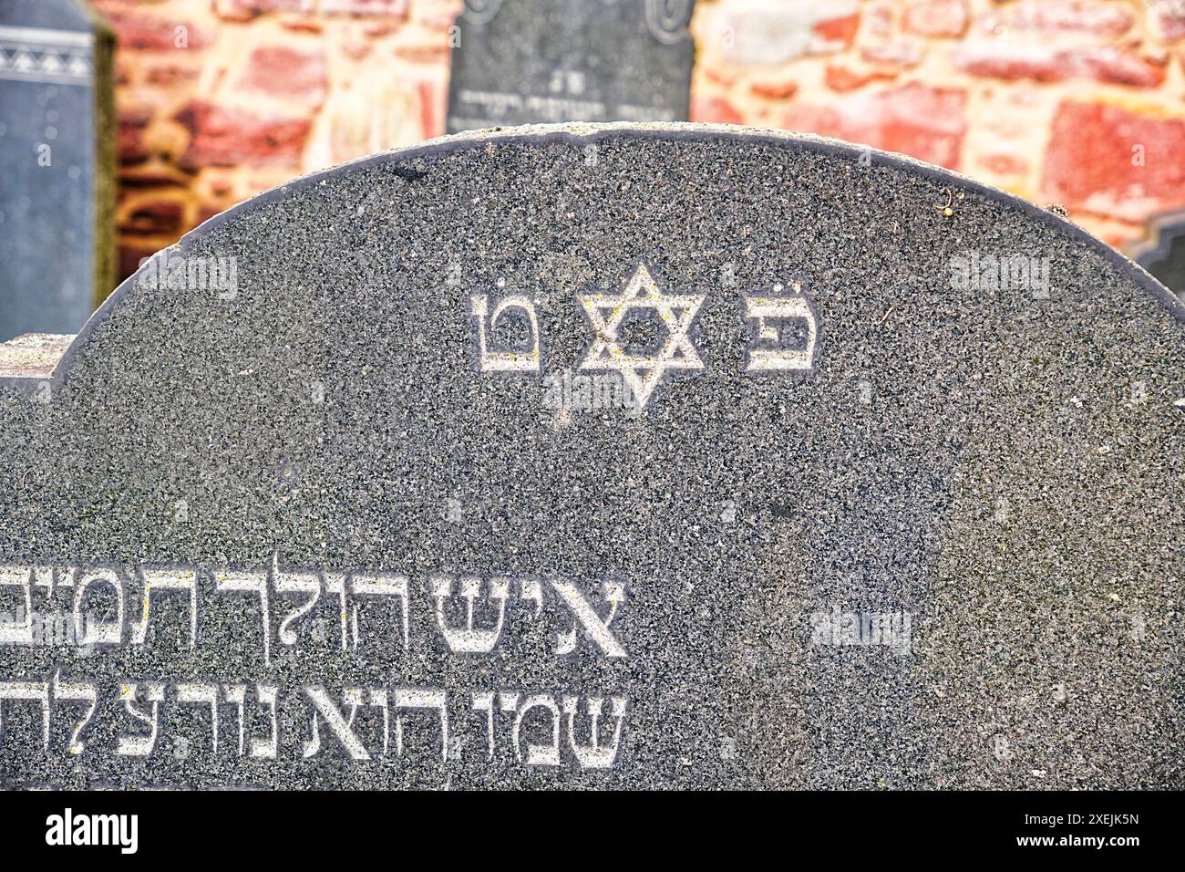 Star of David gravestone symbol at Jewish cemetery Stock Photo - Alamy