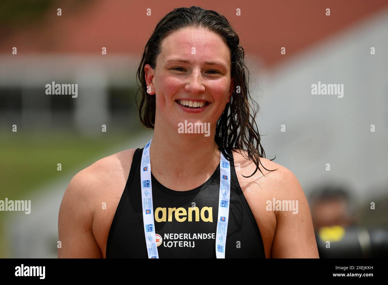 Kim Busch of the Netherlands looks on after competing in 50m Butterfly ...