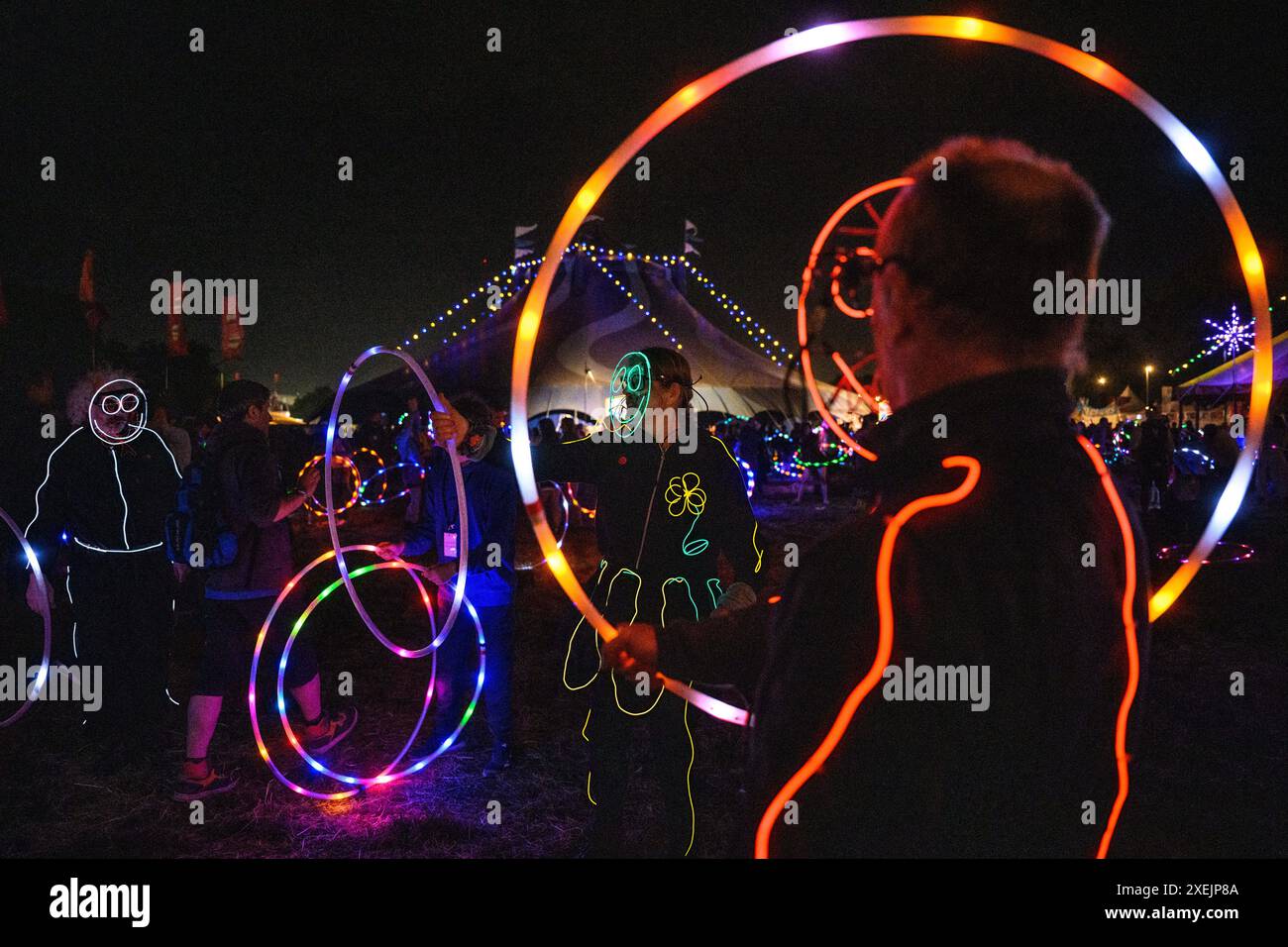 London, UK. 27 June 2024. Atmosphere in the circus field on the second ...