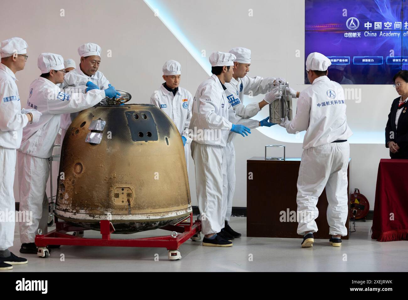 BEIJING, June 28, 2024 (Xinhua) -- Researchers prepare to weigh Chang'e ...