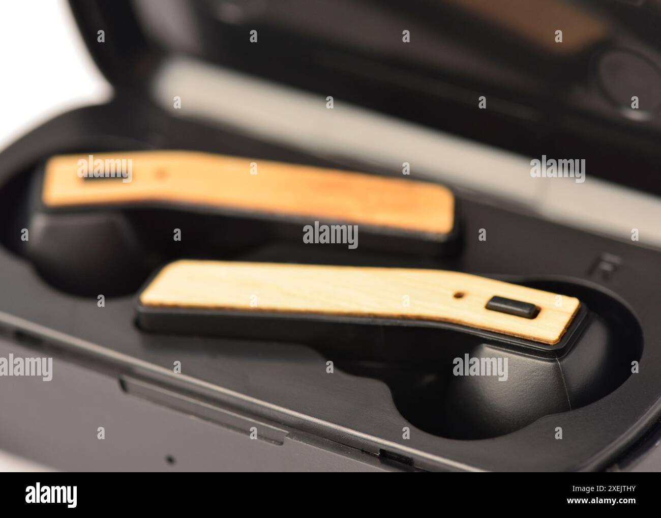 Bamboo free flow tws earbuds in case Stock Photo - Alamy