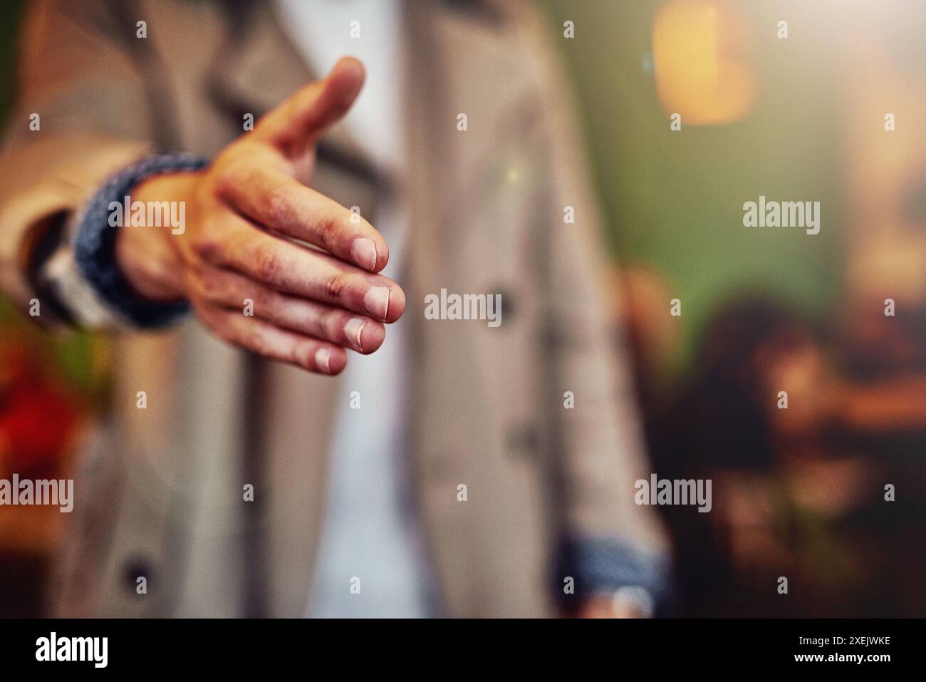 Closeup, handshake and man with greeting, cafe and welcome with ...
