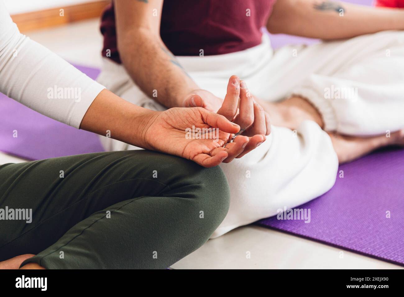 Yogi people practicing yoga lesson. Breathing and meditation in Lotus ...