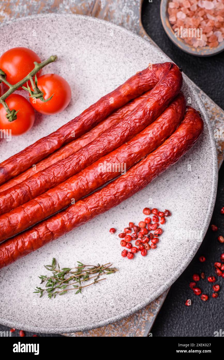 Delicious thin smoked hunting sausages with salt Stock Photo - Alamy