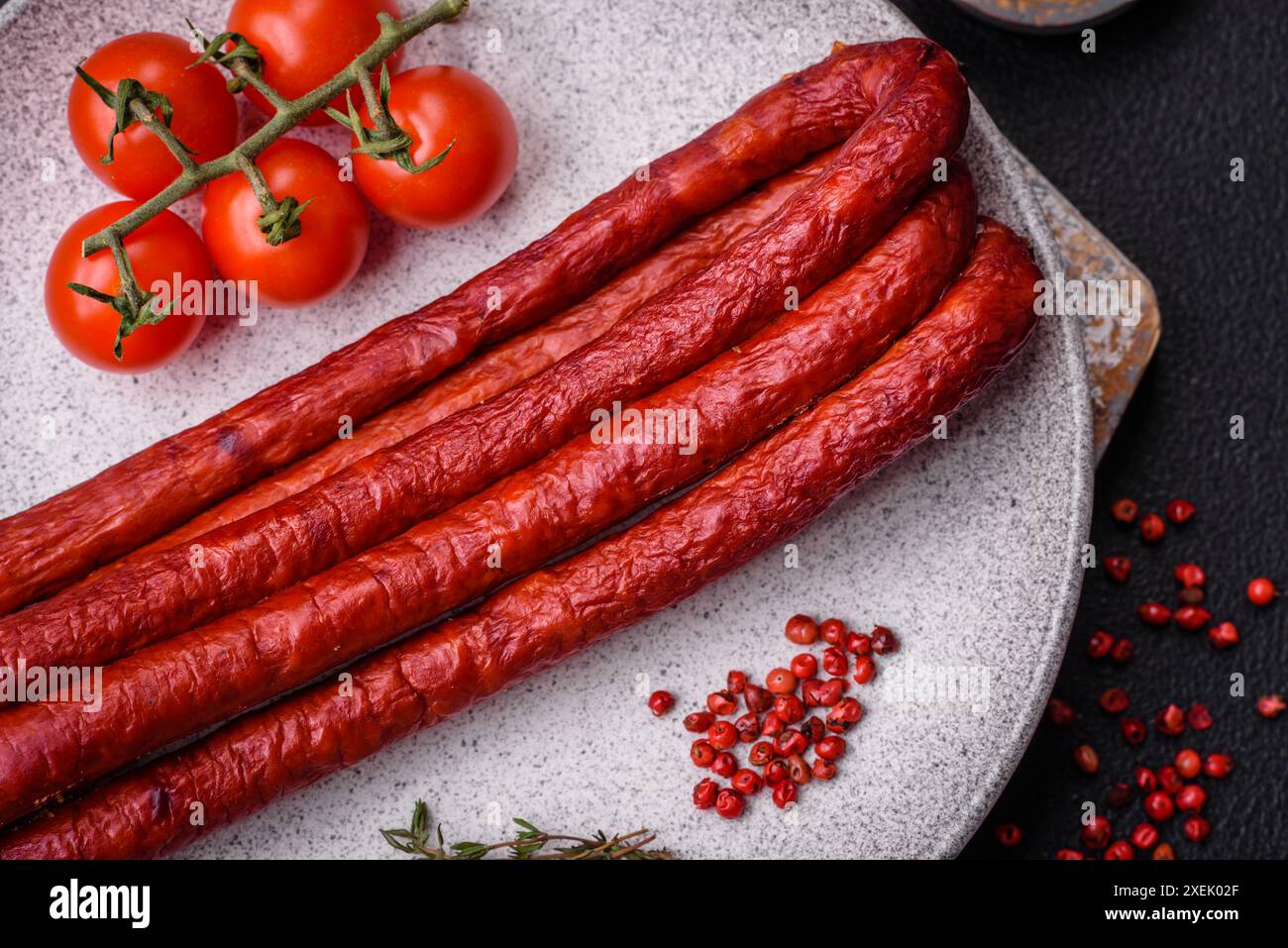 Delicious thin smoked hunting sausages with salt Stock Photo - Alamy