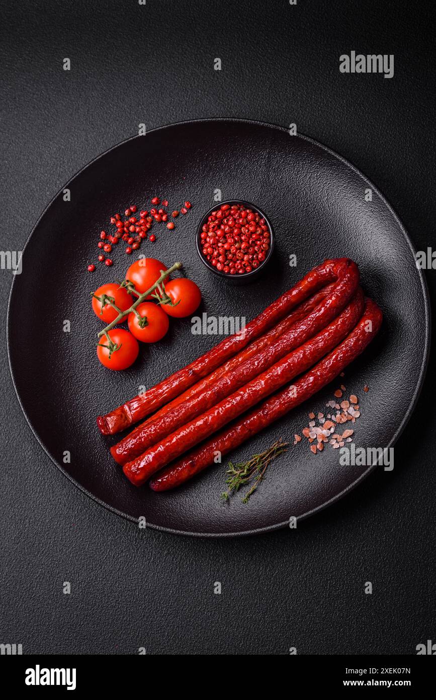 Delicious thin smoked hunting sausages with salt, spices and herbs ...