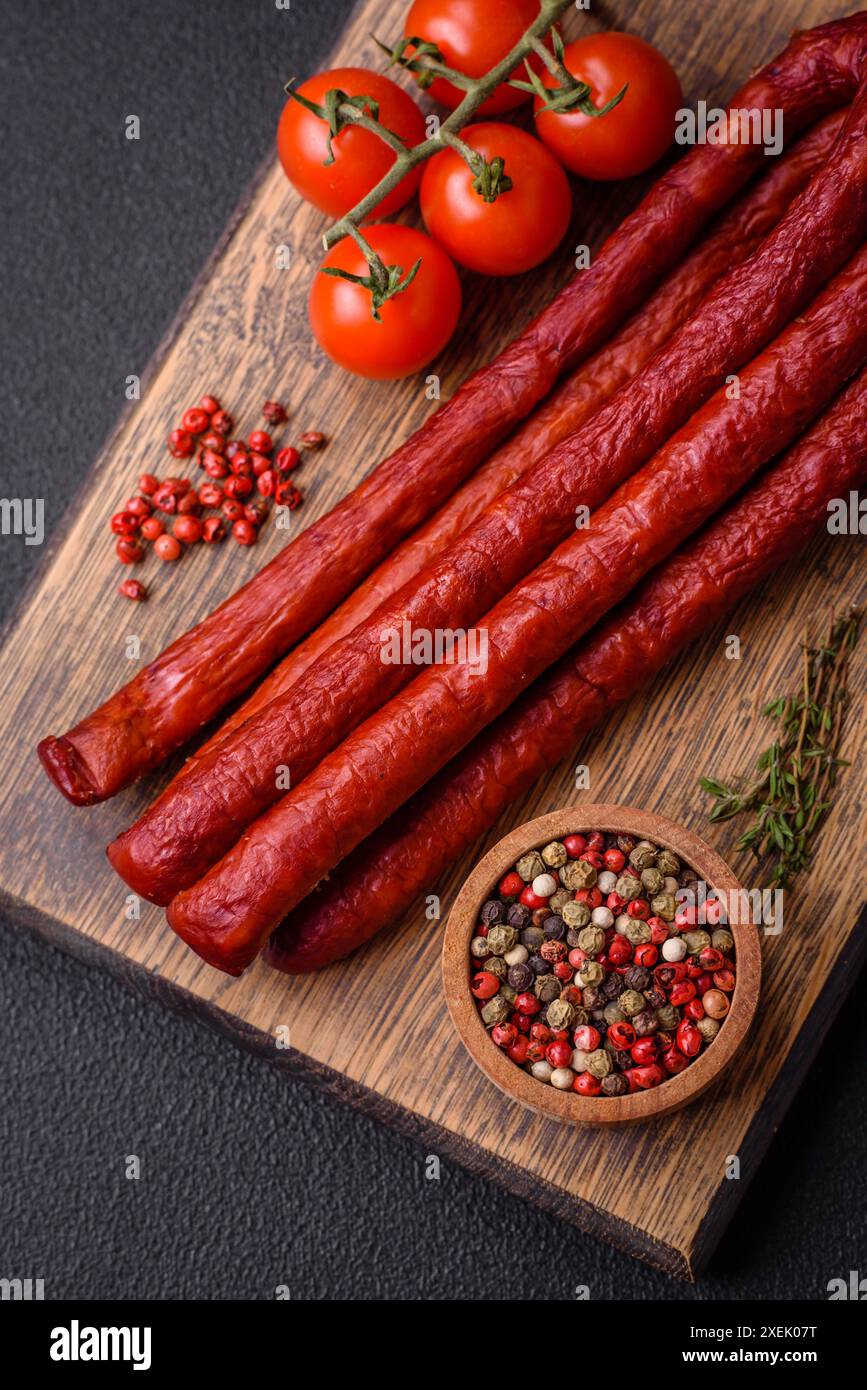 Delicious thin smoked hunting sausages with salt, spices and herbs ...