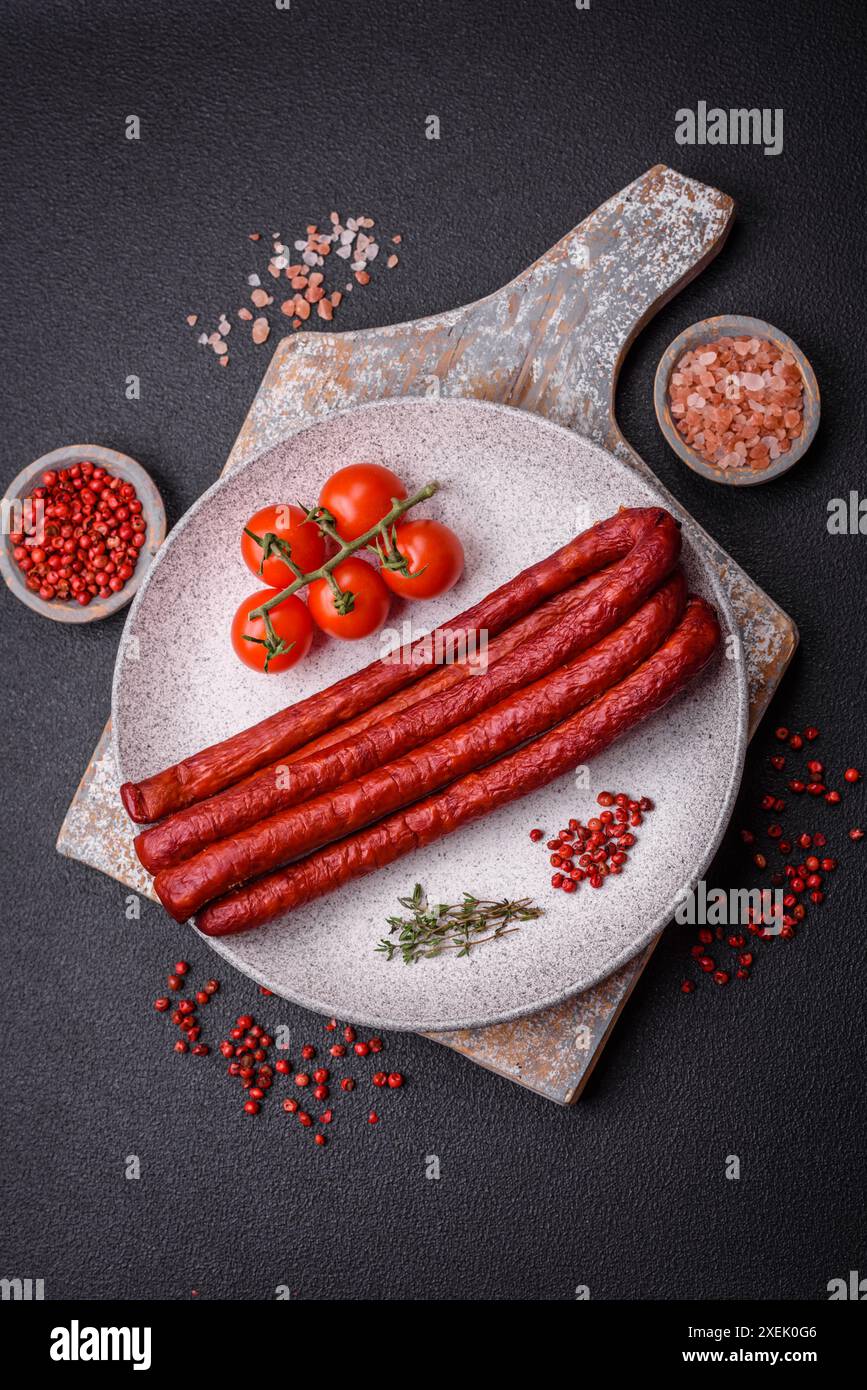 Delicious thin smoked hunting sausages with salt, spices and herbs ...