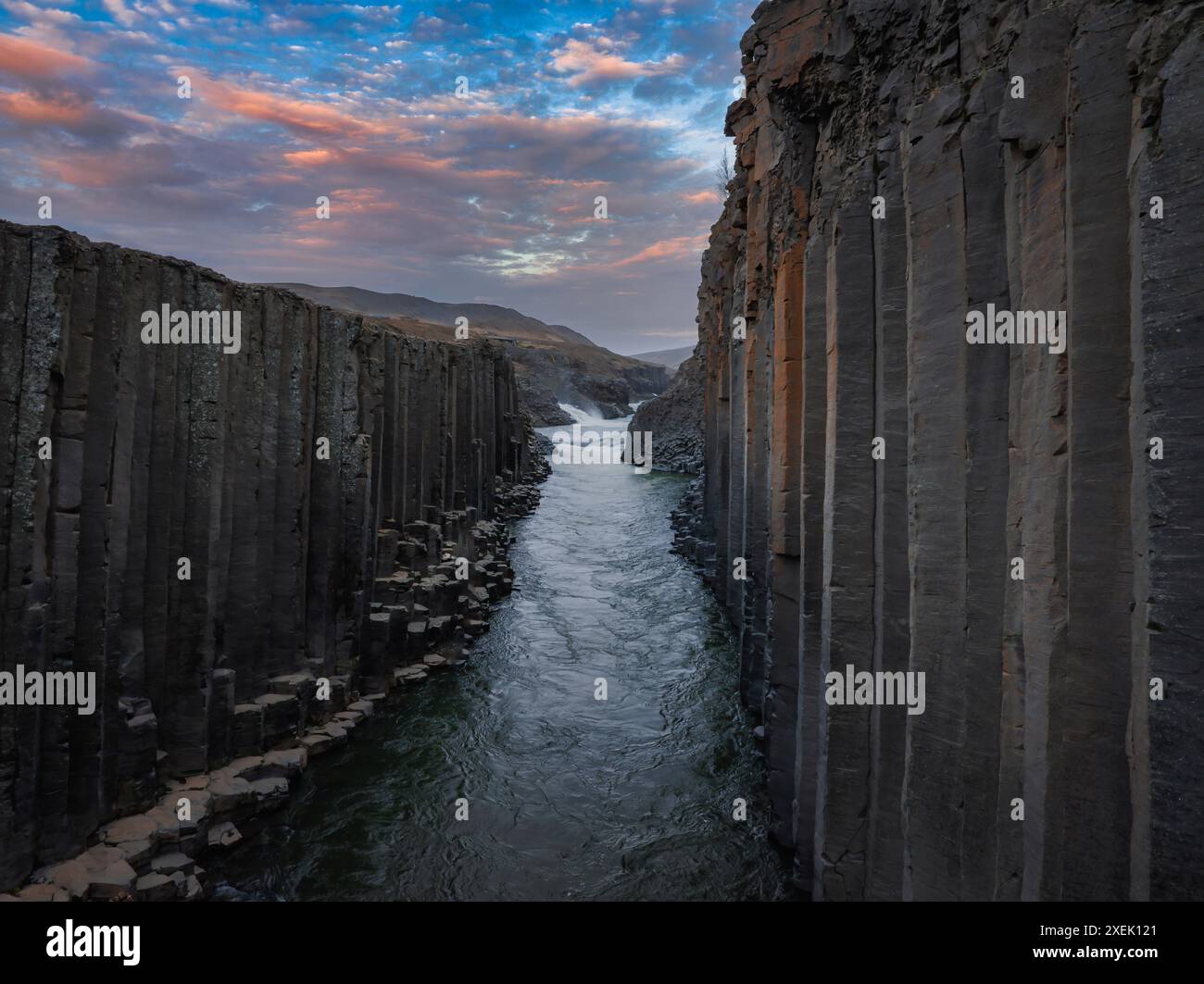 Aerial View of River Flowing Through Narrow Canyon with Dramatic Sky ...