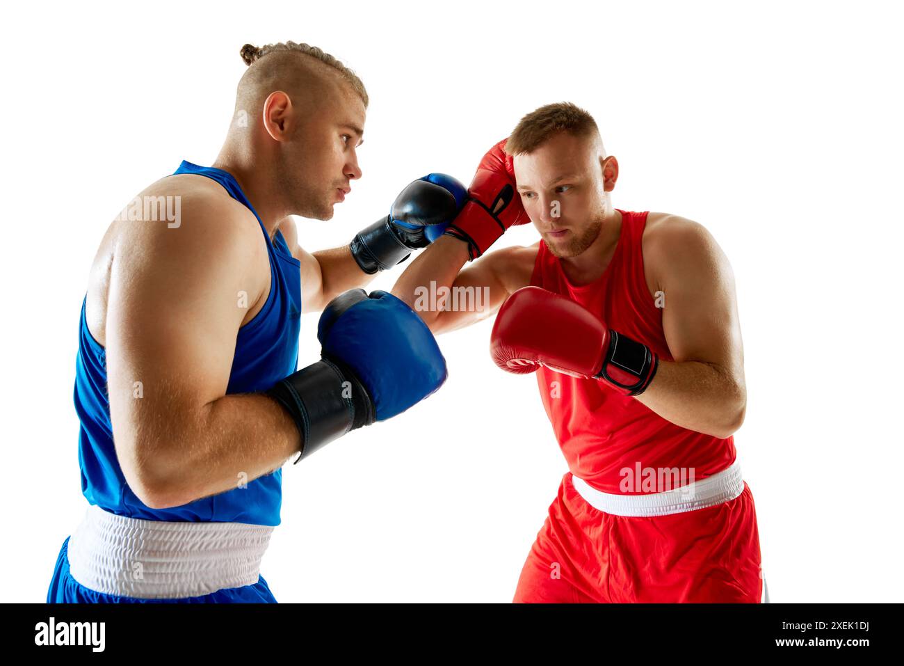 Two fighters in midst of sparring session, red competitor against blue ...
