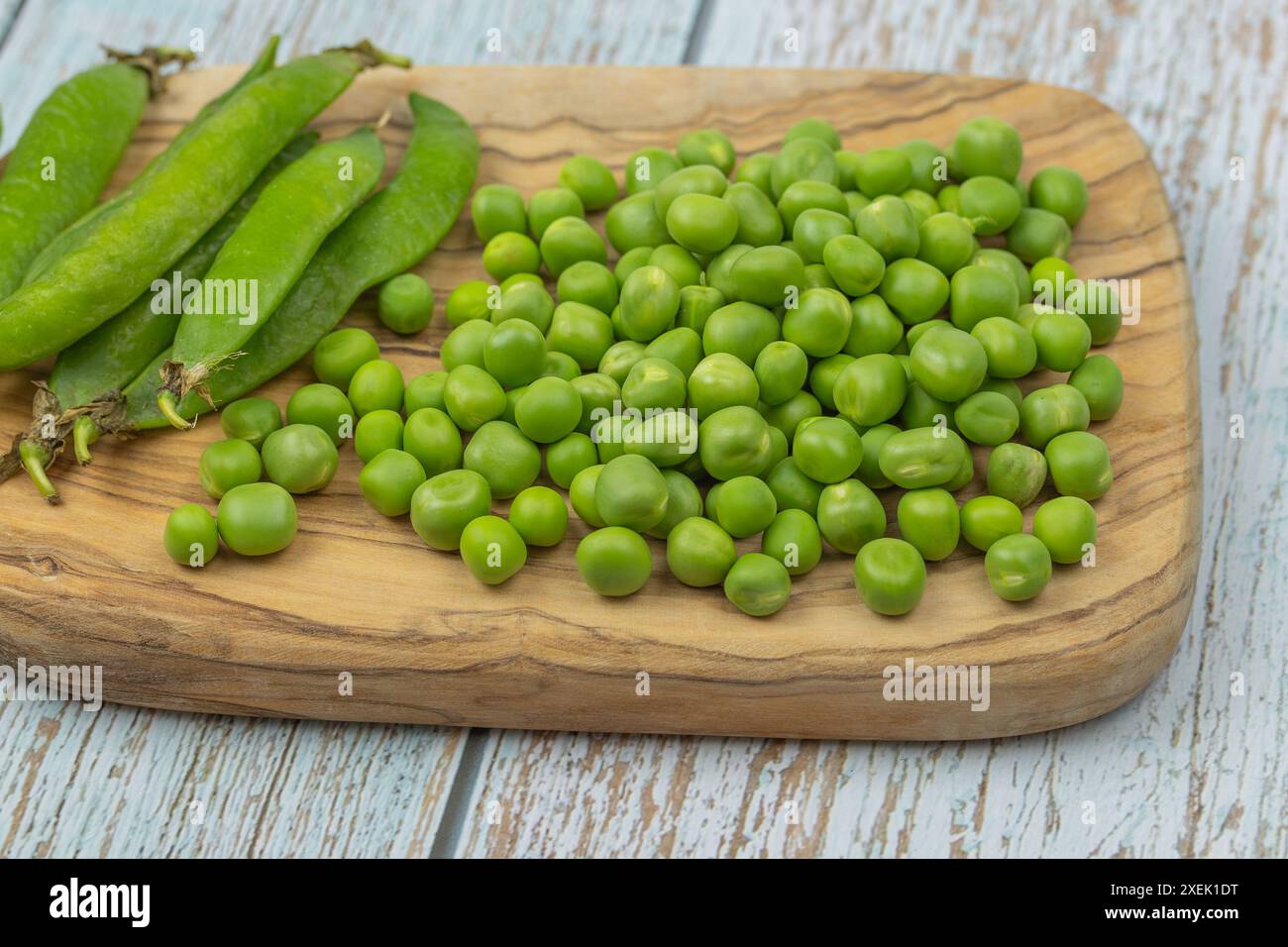pile of raw peas on a table Stock Photo - Alamy