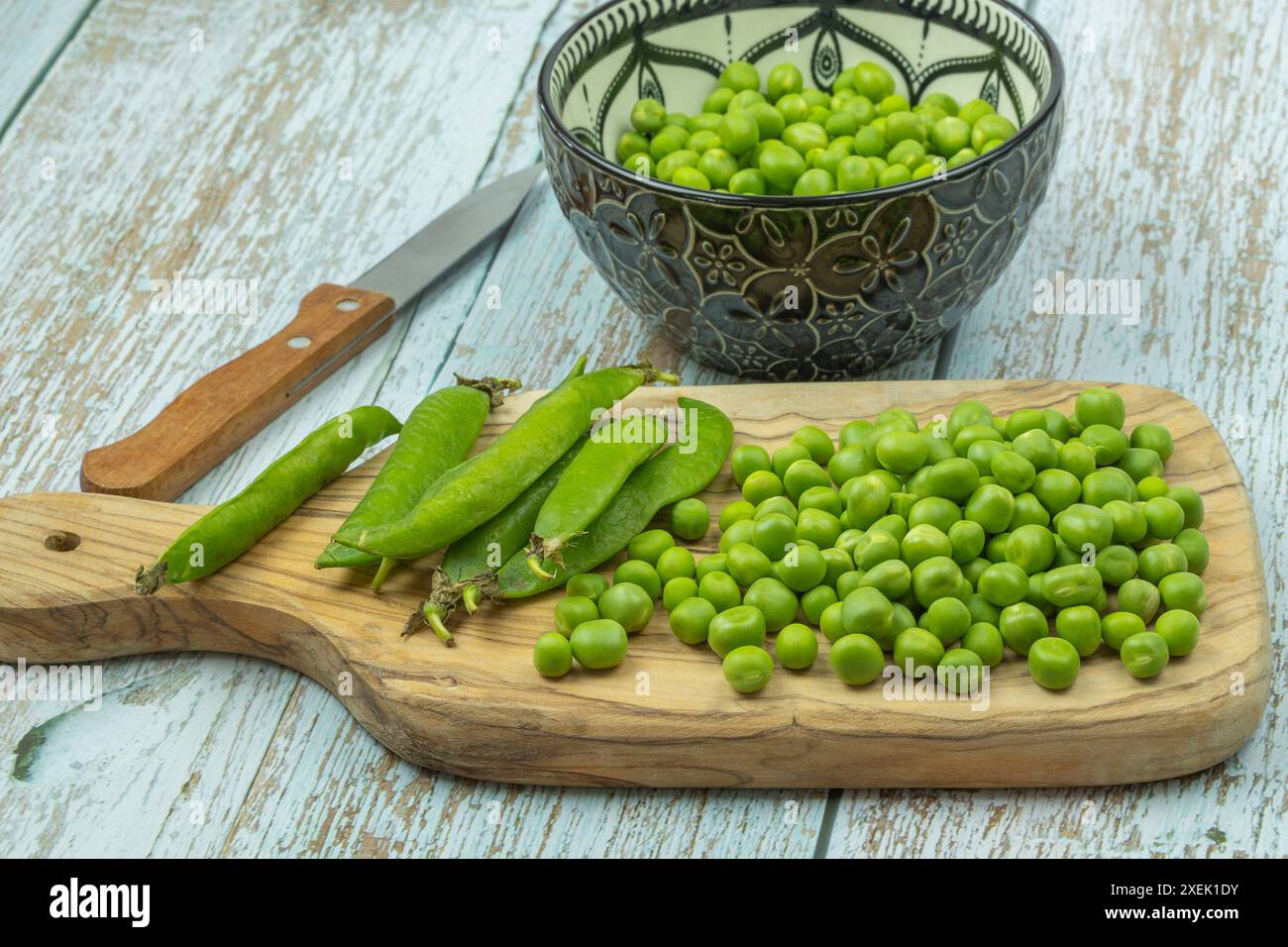 pile of raw peas on a table Stock Photo - Alamy
