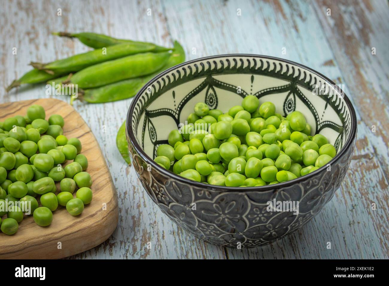 pile of raw peas on a table Stock Photo - Alamy