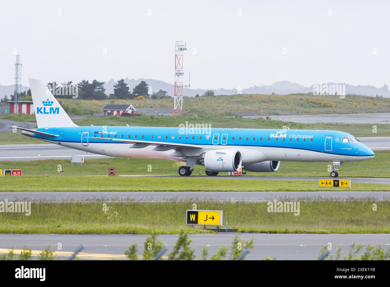 A KLM Embraer 195 E2 regional aircraft arriving in Bergen in Norway ...