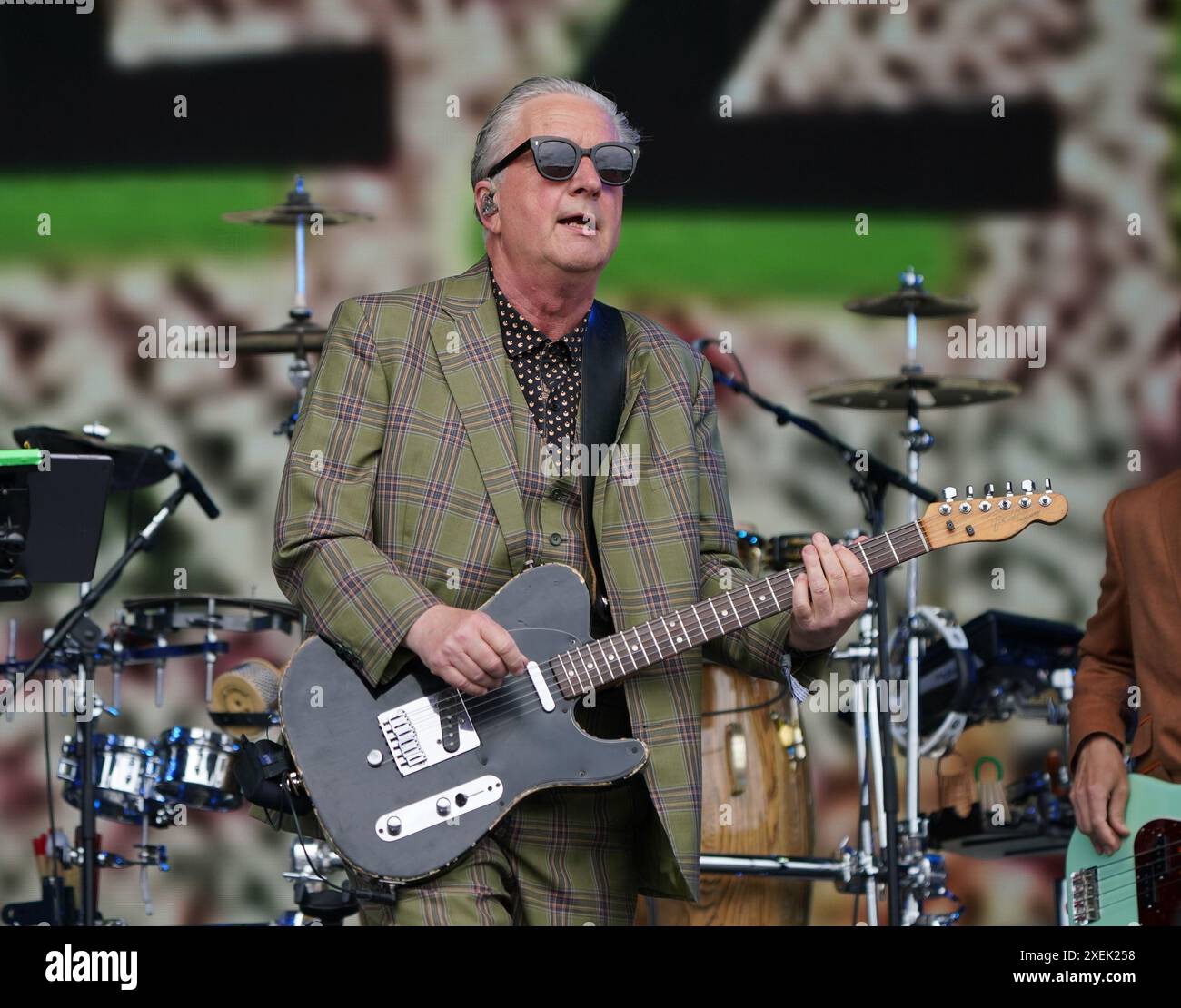 Glenn Tilbrook of Squeeze performing on the Pyramid Stage, at the ...