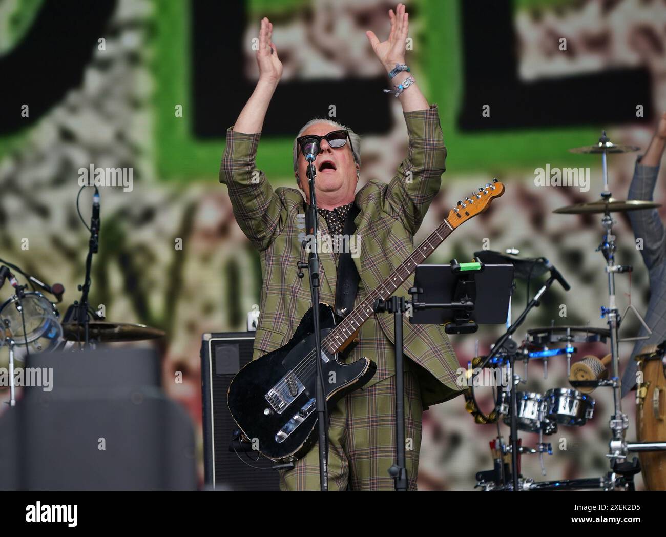 Glenn Tilbrook of Squeeze performing on the Pyramid Stage, at the ...