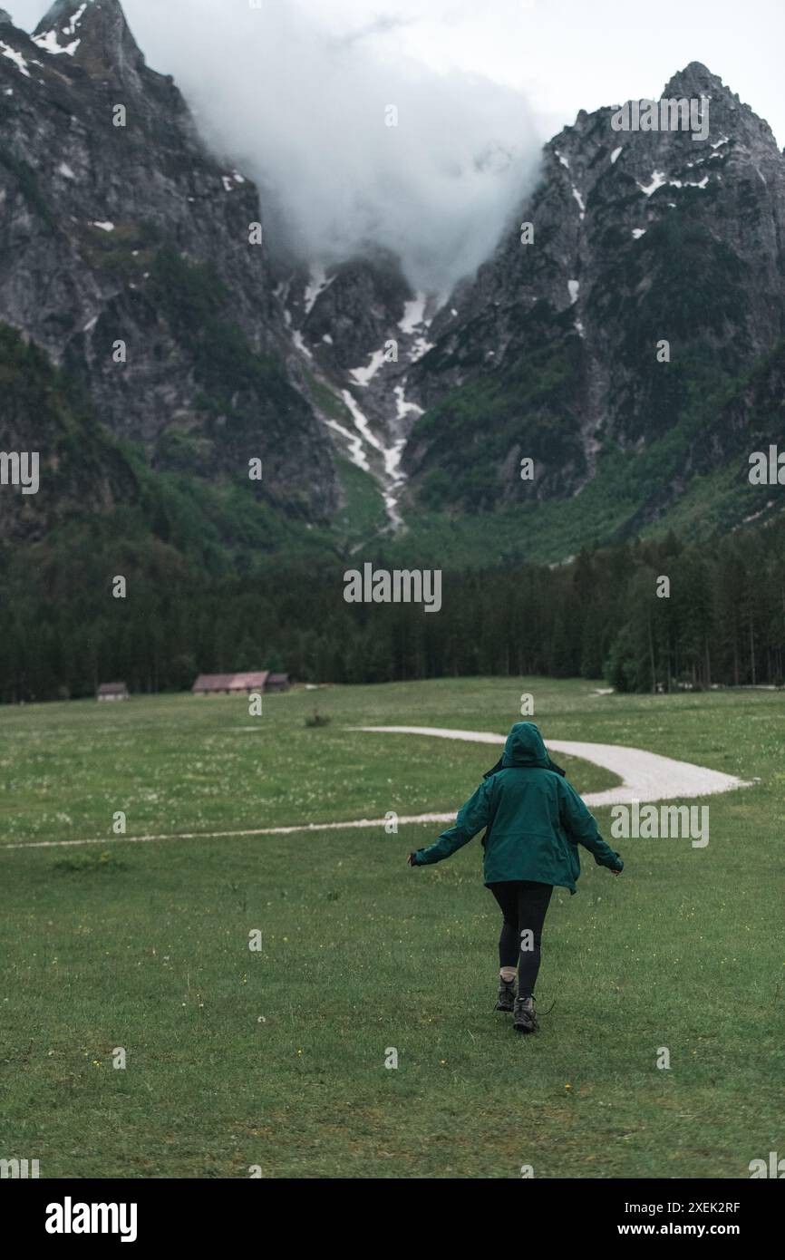 Smiling Adventurous Woman Exploring the Stunning Alps on a Hike Stock ...