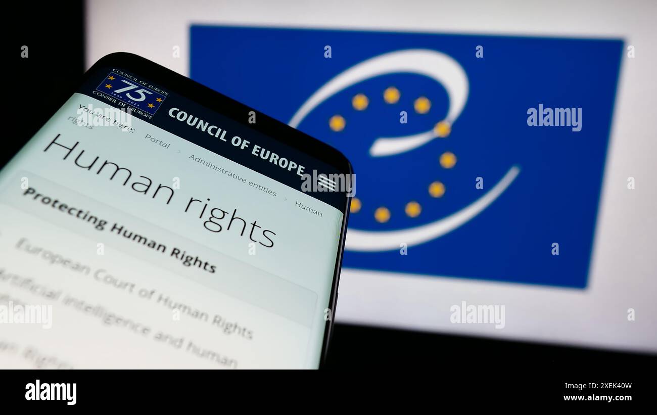 Smartphone with webpage of human rights organisation Council of Europe ...