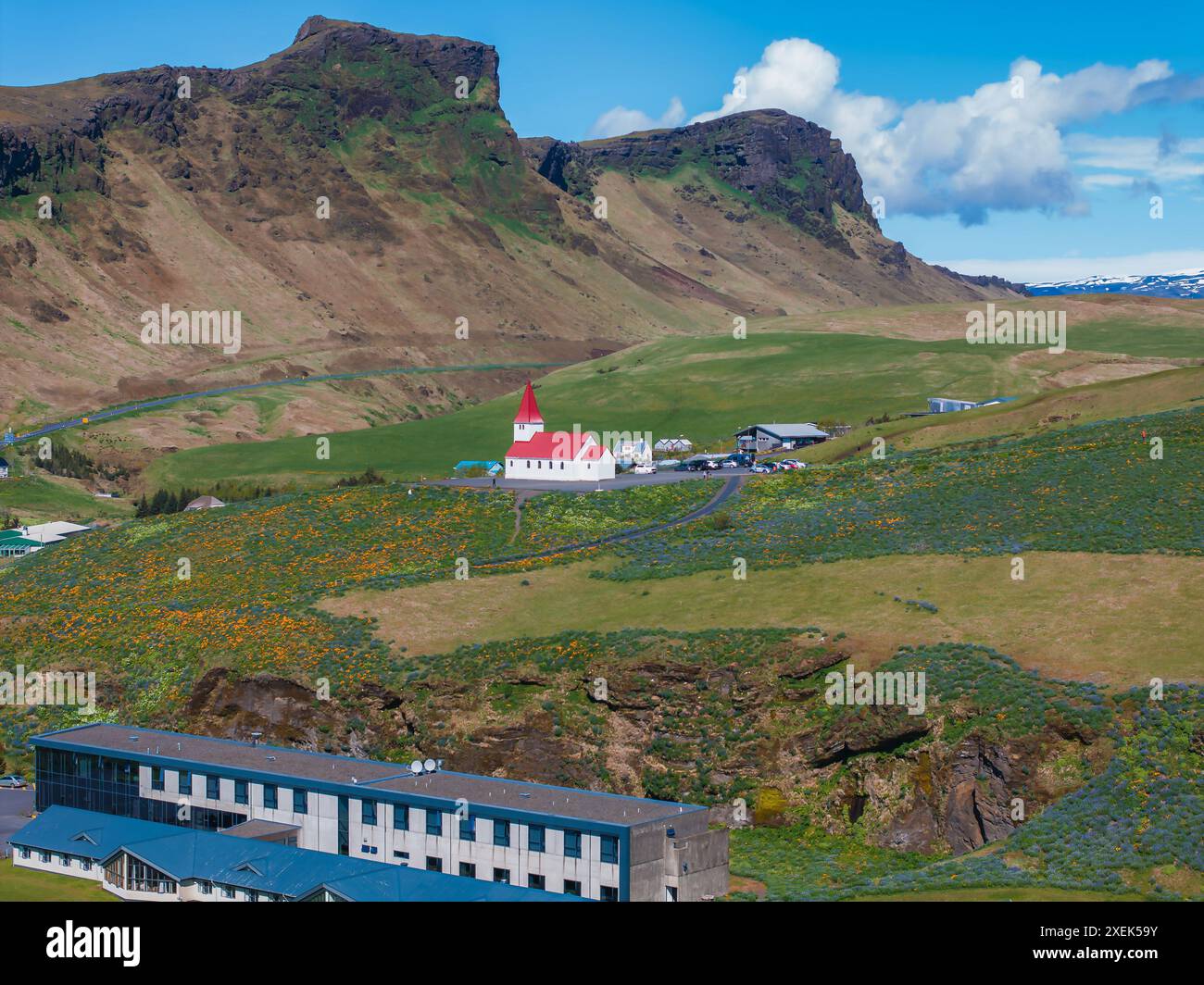 Aerial View of Red Roof Church in Vik i Myrdal, Iceland Surrounded by ...