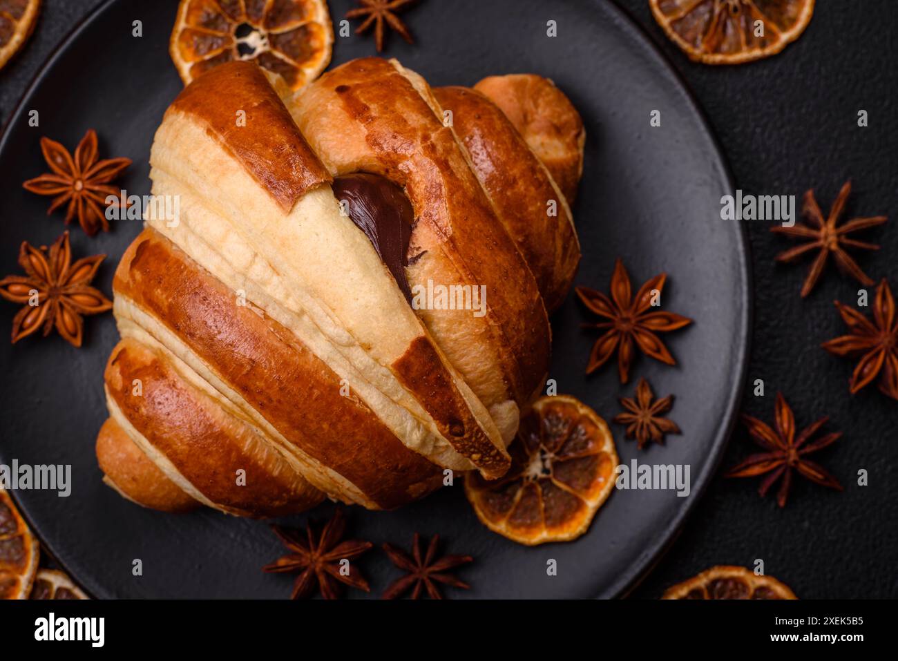 Delicious crispy sweet croissant cornet with chocolate Stock Photo - Alamy