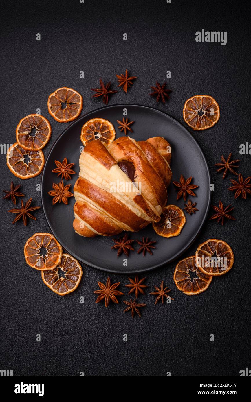 Delicious crispy sweet croissant cornet with chocolate Stock Photo - Alamy