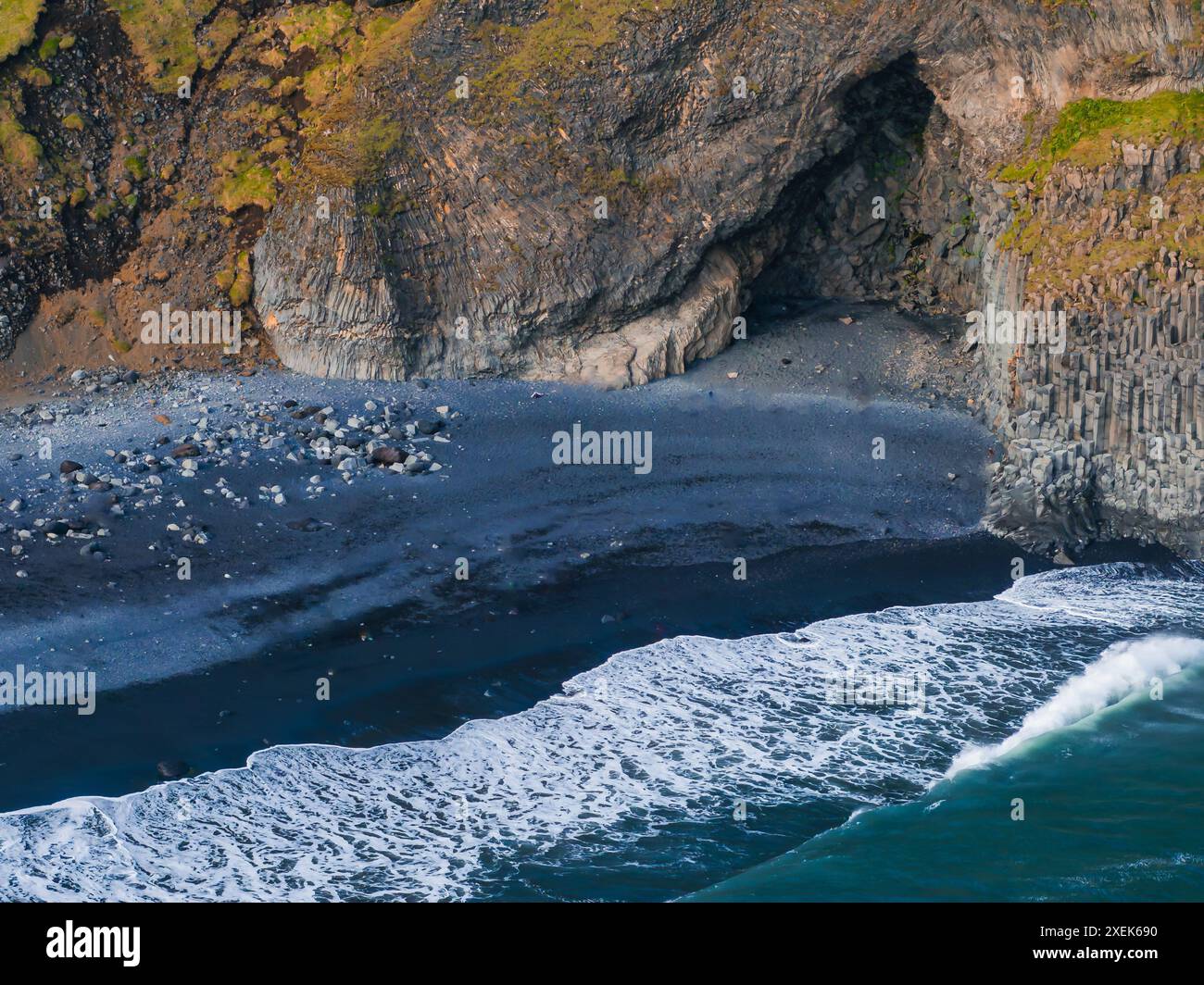 Black Sand Beach with Basalt Columns and Cliffside Cave in Iceland ...