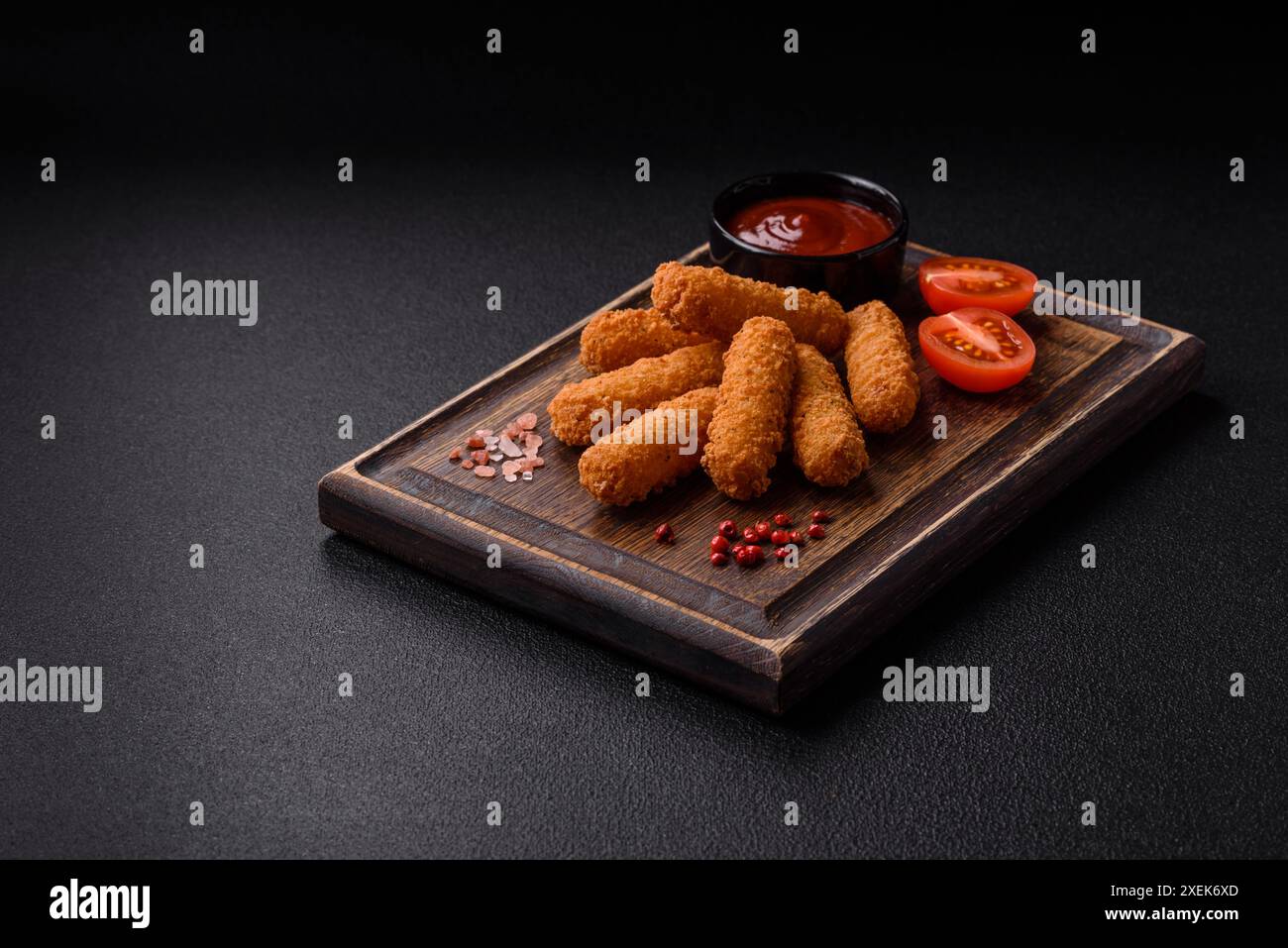 Delicious crispy cheese sticks with mozzarella, salt and spices Stock ...