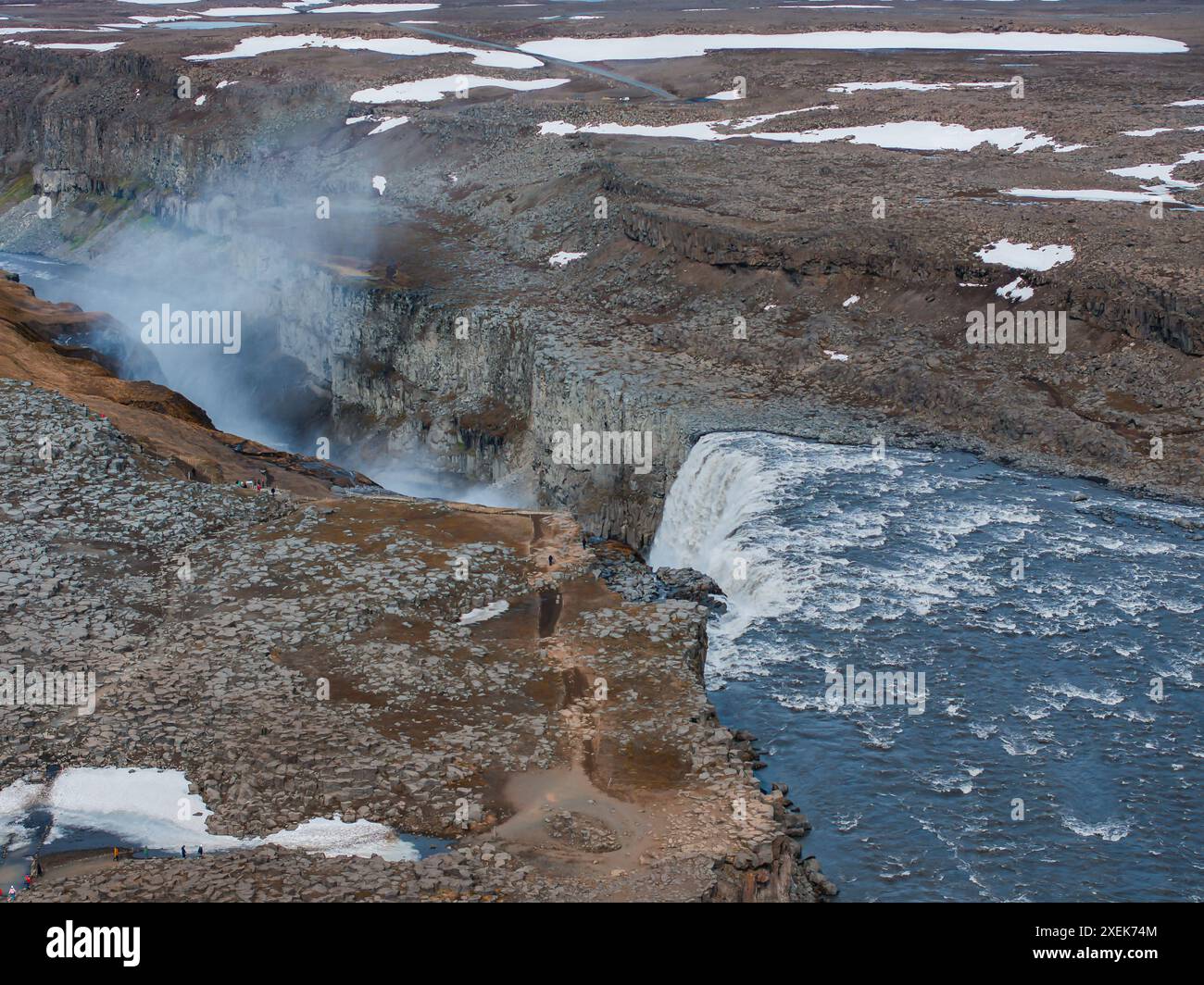 Aerial View of Majestic Waterfall Cascading into Rapid River in Iceland ...