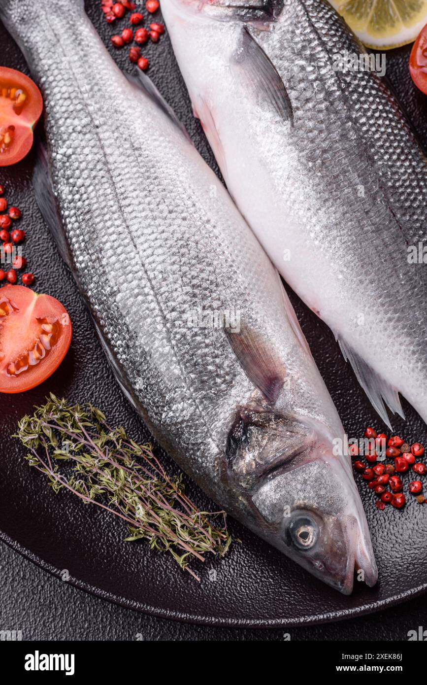 Fresh raw ocean sea bass fish with salt Stock Photo - Alamy