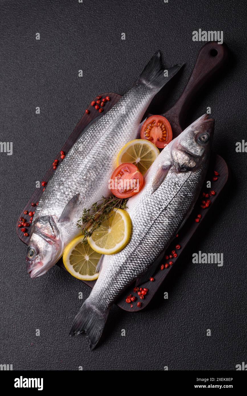 Fresh raw ocean sea bass fish with salt Stock Photo - Alamy