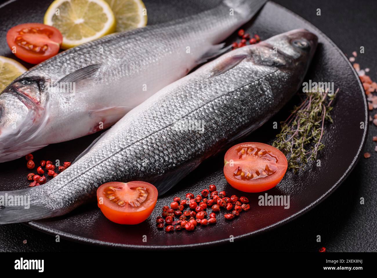 Fresh raw ocean sea bass fish with salt Stock Photo - Alamy