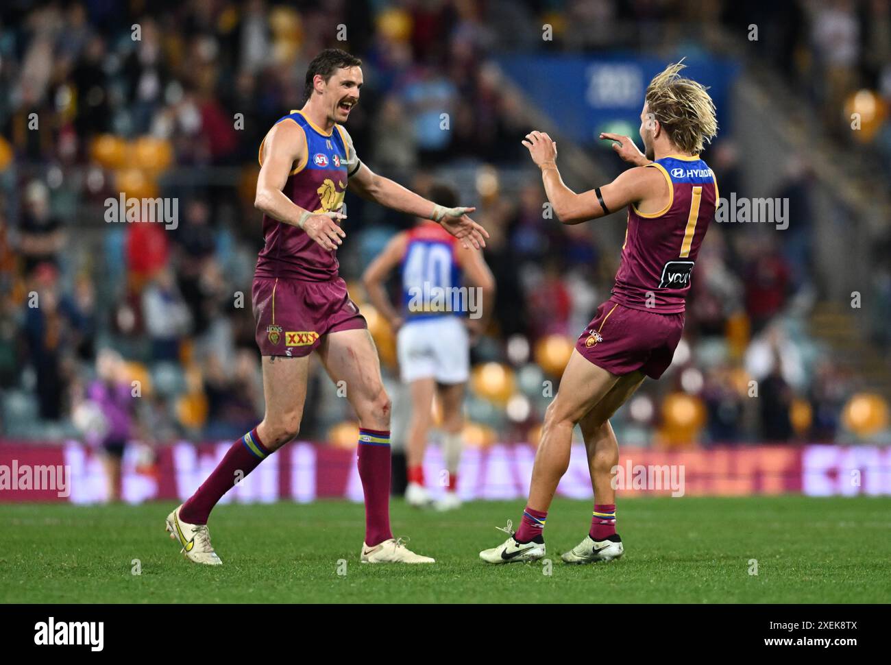 Brisbane, Australia. 28th June, 2024. Joe Daniher (left) and Kai ...