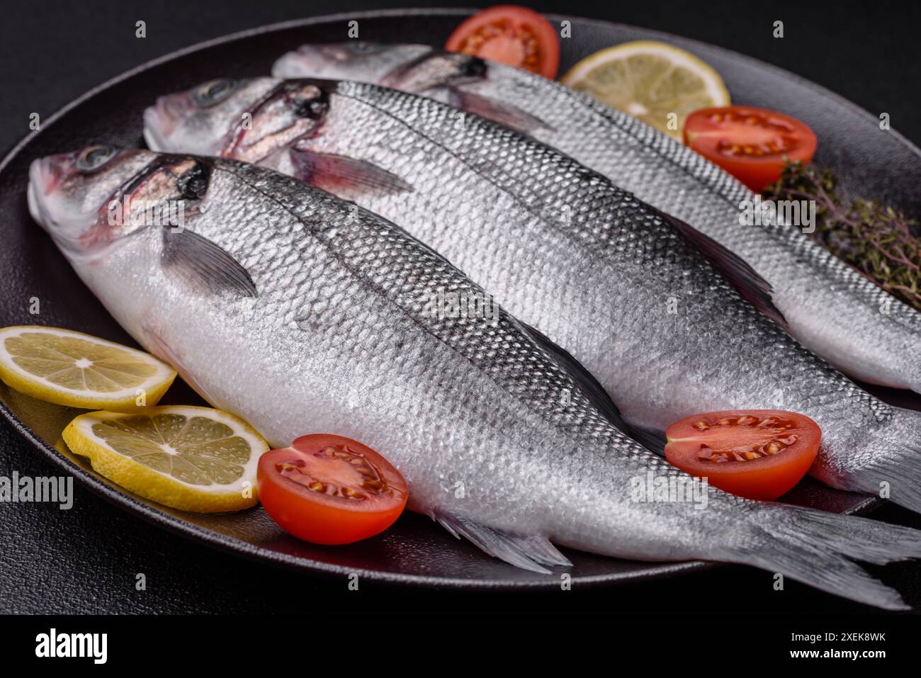 Fresh raw ocean sea bass fish with salt Stock Photo - Alamy