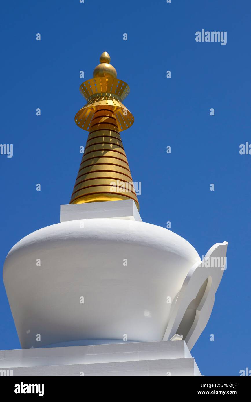 Dome and gold spire of Stupa of Enlightenment Buddhist temple ...