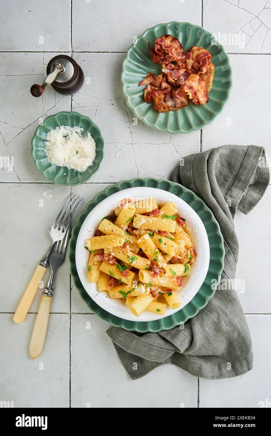 Pasta Tortiglioni or Rigatoni with bacon, parmesan cheese, pepper and ...