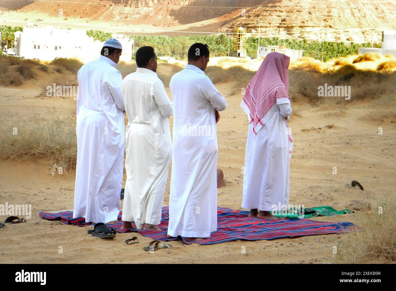 Bedouins During The Prayer. Arabian Desert. Saudi Arabia Stock Photo ...